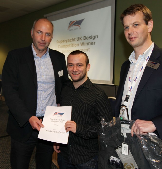 Toby Allies and Tom Chant presents Matthew Bland (centre) with with ...
