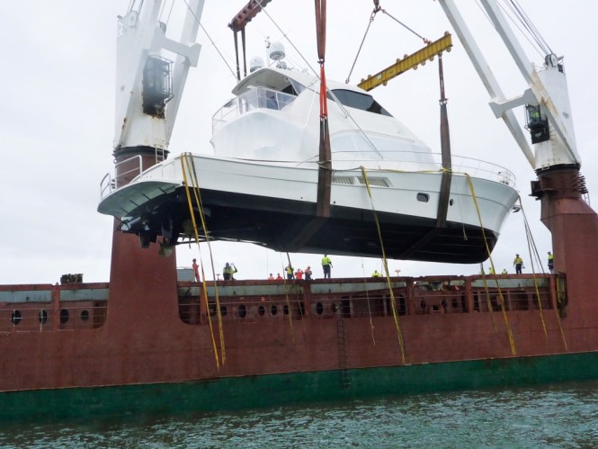 Riviera's first 75 Enclosed Flybridge is loaded onto a ship bound for ...